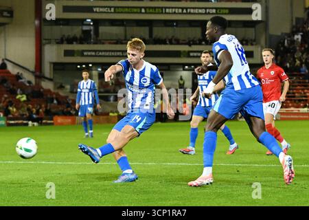 Brighton and Hove Albion's Tom Watson and Burnley's Loum Tchaouna ...