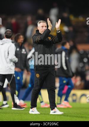 Neil Harris manager of Cambridge United applauds fans during the Sky ...