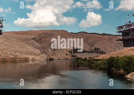 Construction of a bridge over Euphrates (Firat) river under the Ataturk ...