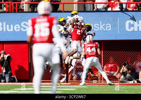 Nebraska quarterback Dylan Raiola watches his team warm up as he ...