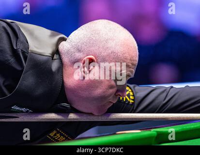 Zhao Xintong in action against Gary Wilson (not in picture)on day two ...