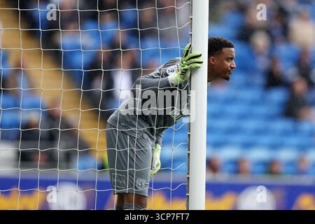Cardiff City goalkeeper Nathan Trott punches clear in the match at The ...