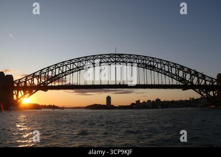 Sydney, Australia - September 2025: ferry with sydney harbour bridge ...