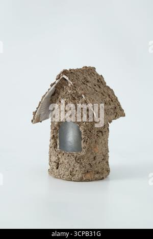 Little paper house placed on a linen canvas Stock Photo - Alamy