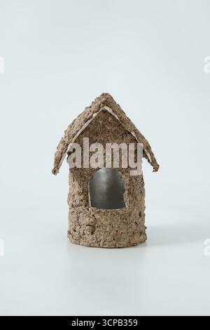 Little paper house placed on a linen canvas Stock Photo - Alamy