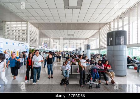 Crowded departure area of NAIA Terminal 2 in Manila, Philippines Stock ...