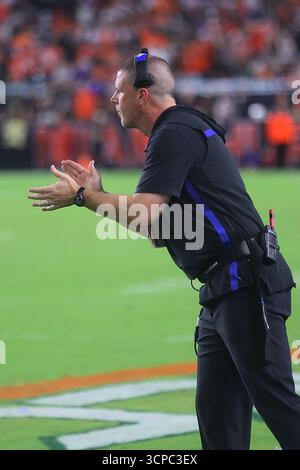 Florida head coach Billy Napier, center, looks on from the sideline ...