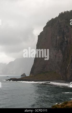 The green olive trees against the cloudy sky. Batea, Terra Alta ...
