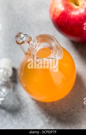 Apple vinegar or cider, bottle of drink and fresh apples, healthy ...