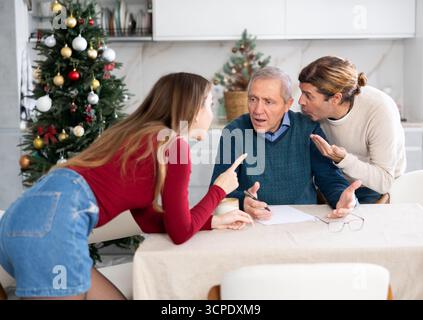 Family members discussing inheritance Stock Photo - Alamy