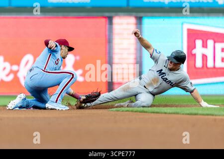 Miami Marlins second baseman Bryson Brigman (90) throws to first base ...