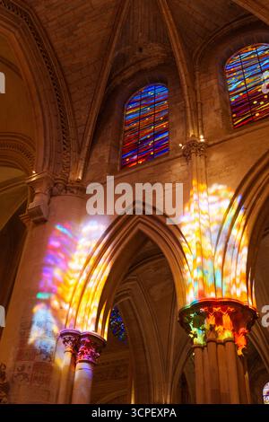 Colorful Stained Glass Window Casting Vibrant Light Patterns on Stone ...