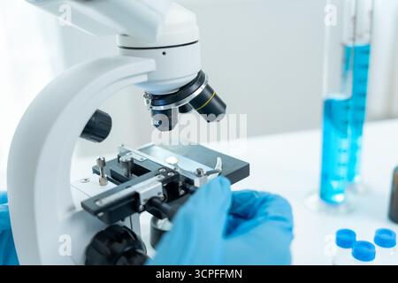 Scientist analyze biochemical samples in advanced scientific laboratory ...