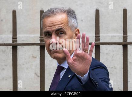 Prime Minister Mark Carney arrives for the Canada Day National noon ...