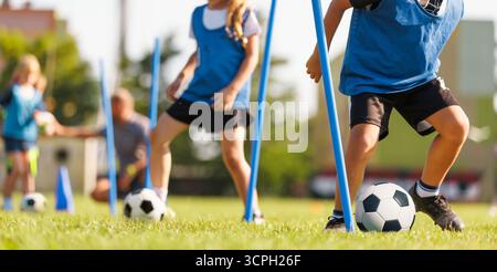 Youth Soccer Slalom Drill Training; Multiethnic Kids Practicing Ball ...
