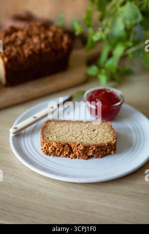 Strawberry jam and pumpkin butter on wooden table Stock Photo - Alamy
