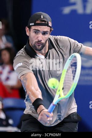 Matteo Berrettini Of Italy Returns The Ball To Stan Wawrinka Of matteo-berrettini-of-italy-returns-the-ball-to-stan-wawrinka-of