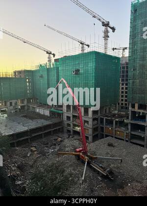 Construction concrete pump (pump truck ) with multi-storey building ...