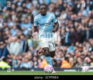 Jeremy Doku of Manchester City breaks with the ball during the Premier ...