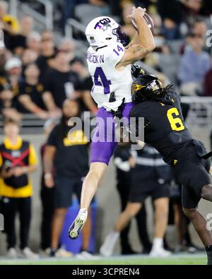 TCU wide receiver Joseph Manjack IV (14) is congratulated by teammates ...