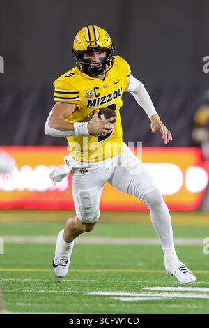 Missouri quarterback Beau Pribula (9) runs for a first down against ...