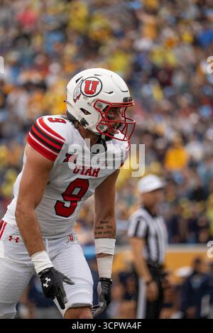 Utah wide receiver Ryan Davis (9) is tackled into the end zone by ...