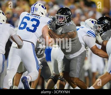 BYU offensive lineman Bruce Mitchell (63) looks to block during the ...