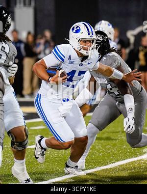 Brigham Young quarterback Bear Bachmeier (47) runs the football during ...