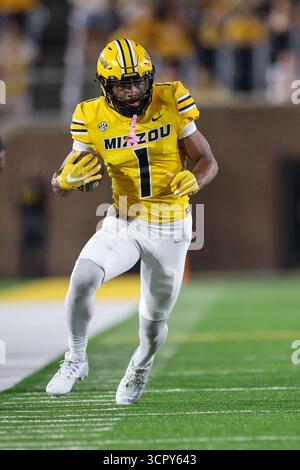 Missouri wide receiver Donovan Olugbode (1) stiff arms Oklahoma ...