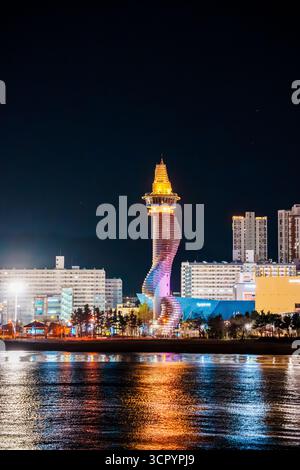 Sokcho Expo Tower rises above Sokcho city and waterfront, mirrored in ...