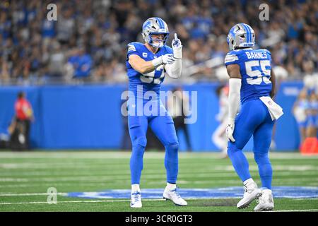 Detroit Lions defensive end Derrick Moore walks to an NFL football ...