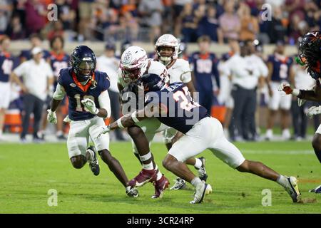 Florida State running back Ousmane Kromah (32) is tackled by Florida ...