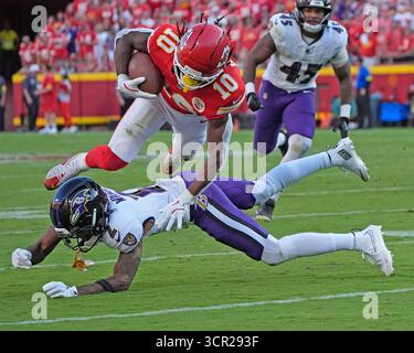 Baltimore Ravens cornerback Nate Wiggins (2) tackles Kansas City Chiefs ...