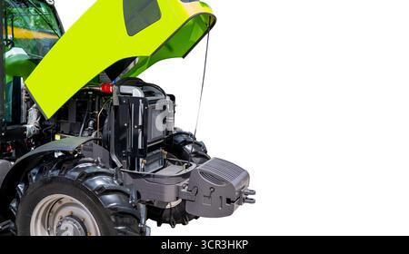 Construction tractor with open hood Stock Photo - Alamy