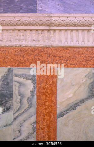 Ornate marble wall with intricate patterns and mosaic reflections in a ...
