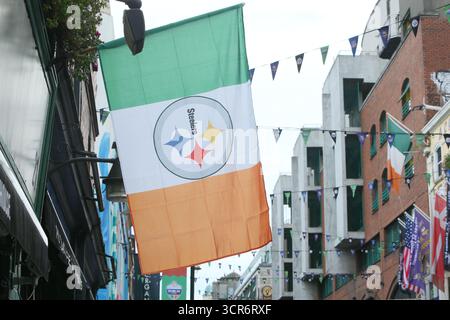 Dublin, Ireland - 29th September 2025 - Irish tricolour flags with the ...