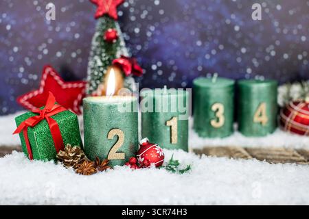 advent candles in snow, 2nd Advent Stock Photo - Alamy