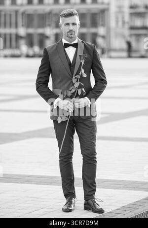 elegant man in tux. man wearing tux suit outside. hoary tux man with ...