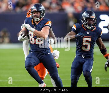 Denver Broncos tight end Adam Trautman (82) stands for the National ...