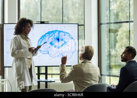 Young doctor in presentation concept Stock Photo - Alamy