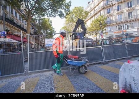 29 September 2025. Construction workers digging up a road in Paris ...