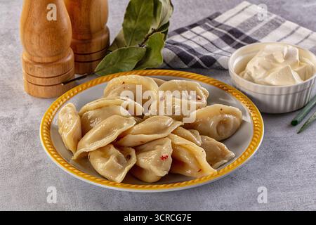 Traditiolal vareniki - stuffed dumplings with potato and onion Stock ...