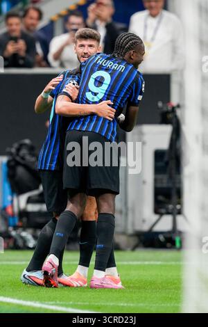 Marcus Thuram (L) and Lautaro Martinez (R) of Inter celebrate the goal ...