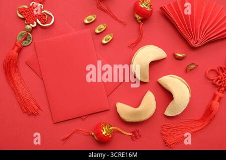Fortune cookies with red envelopes and Chinese symbols on grunge ...