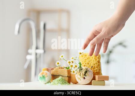 Female hand with soap on color background Stock Photo - Alamy