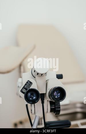 Close up colposcope on the background of ultrasound machine in ...