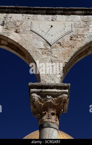 Sundial seen on one of the Arches of Scales, under is the Dome of the ...