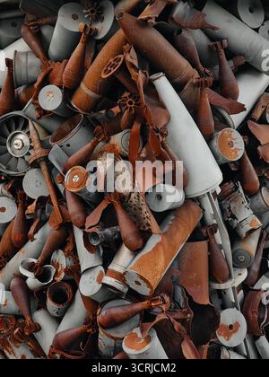 A close-up view of a rusty metal surface reveals textures and patterns ...