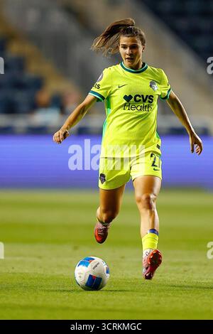 Washington Spirit forward Sofia Cantore, left, takes a shot at a goal ...