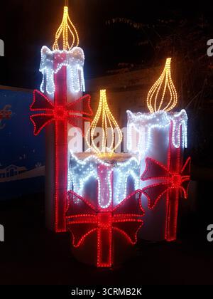 A festive atmosphere is created at Christmas with red berries and a ...